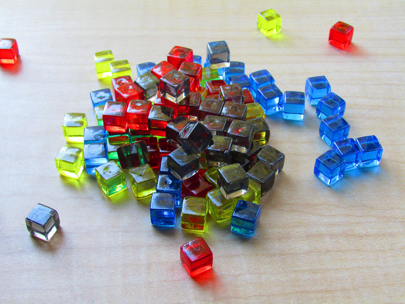 Colored translucent game cubes scattered on a table - Free stock photos ...